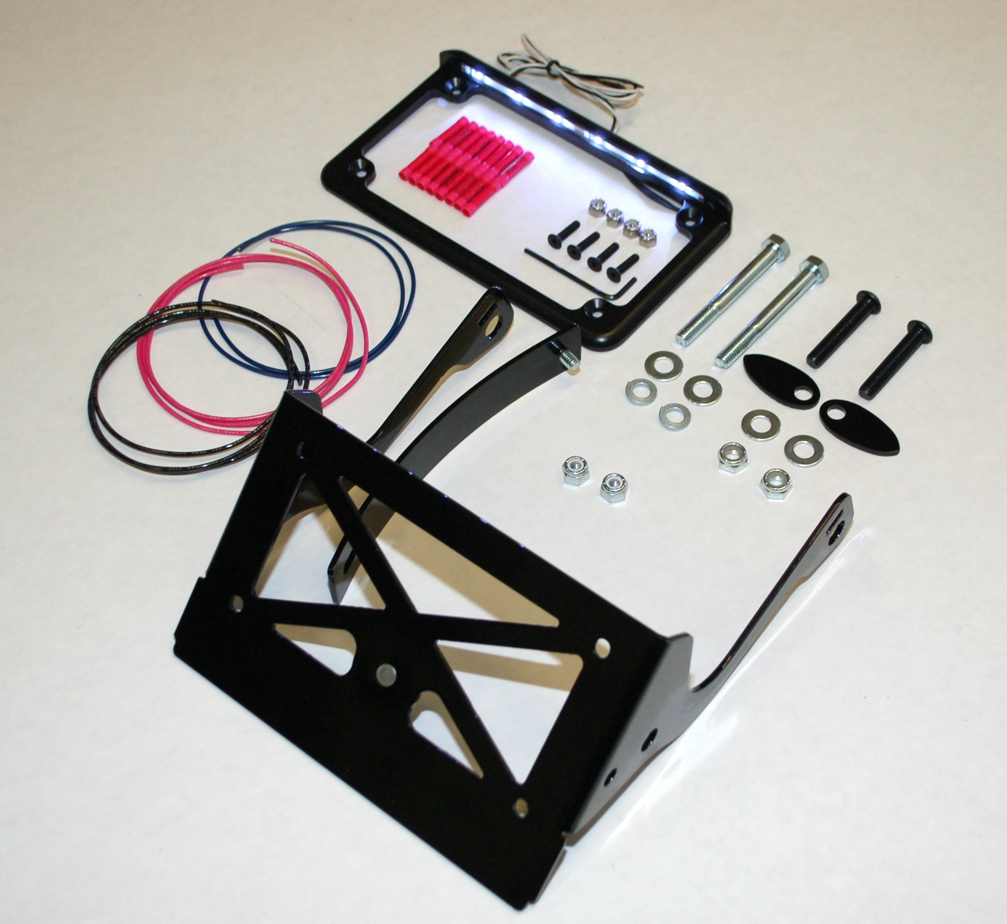 LPSPTNIGHT License Plate and Turn Signal Relocation Kits for Harley Da